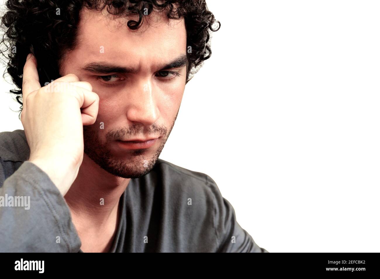 Latino male contemplating hi-res stock photography and images - Alamy