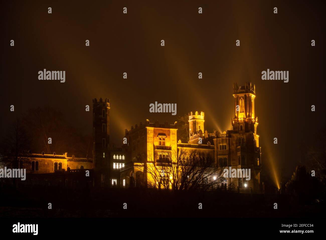 Castle with lights on captured at night Stock Photo - Alamy