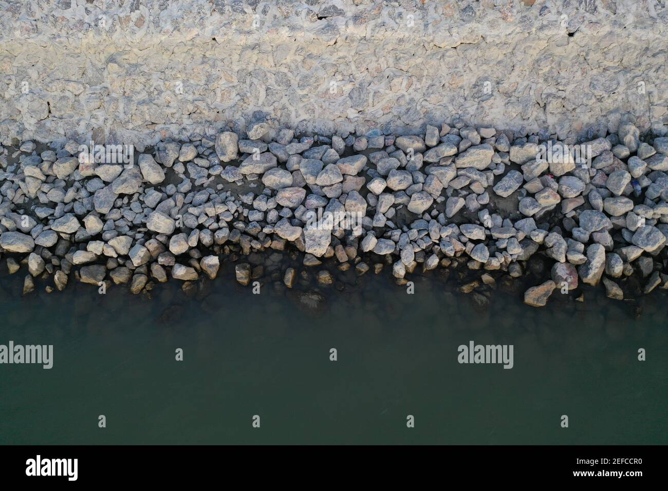 Little rocks at a beach - a rocky beach Stock Photo - Alamy