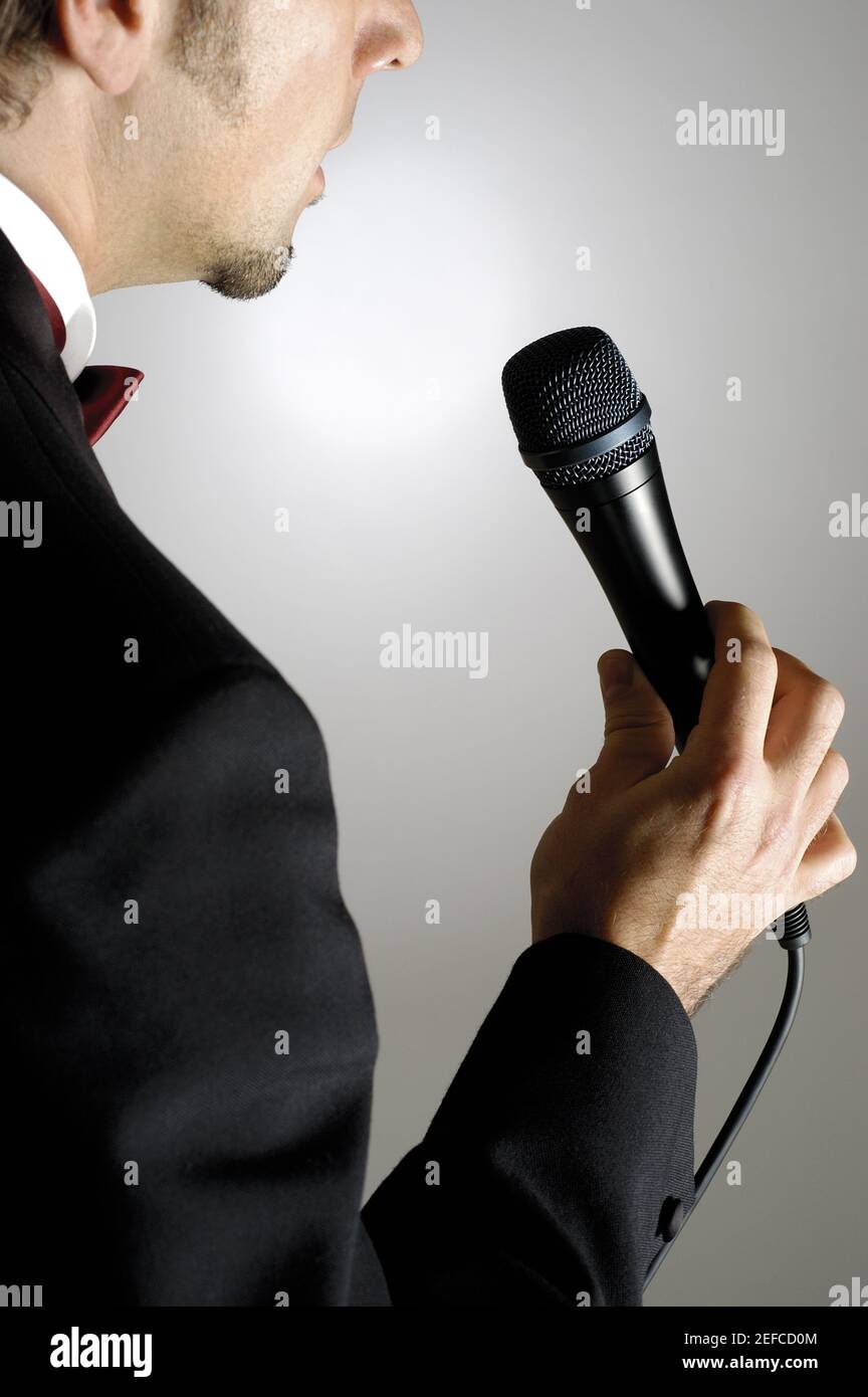 Side profile young man singing hi-res stock photography and images - Alamy