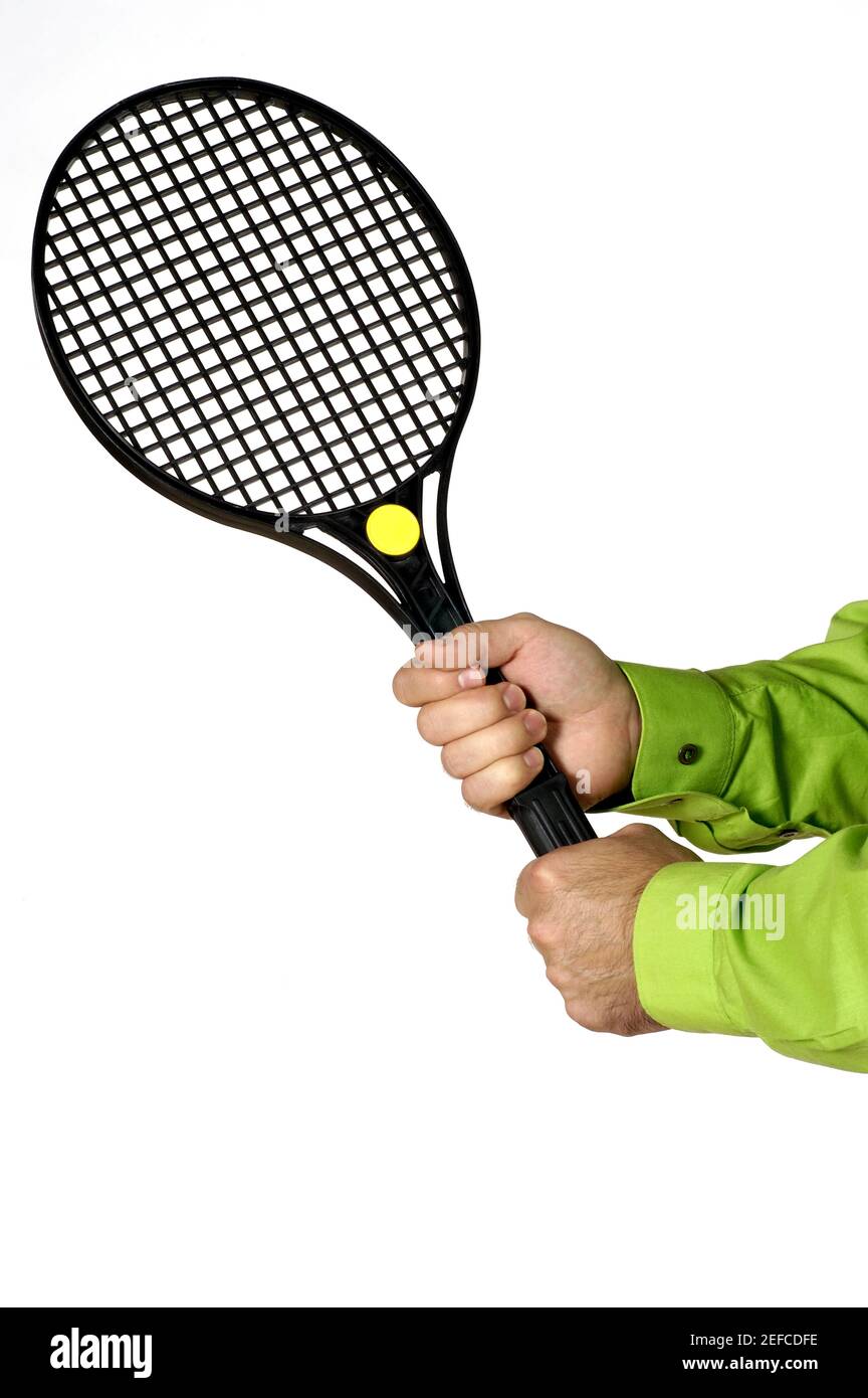 Male hand holding tennis hi-res stock photography and images - Alamy