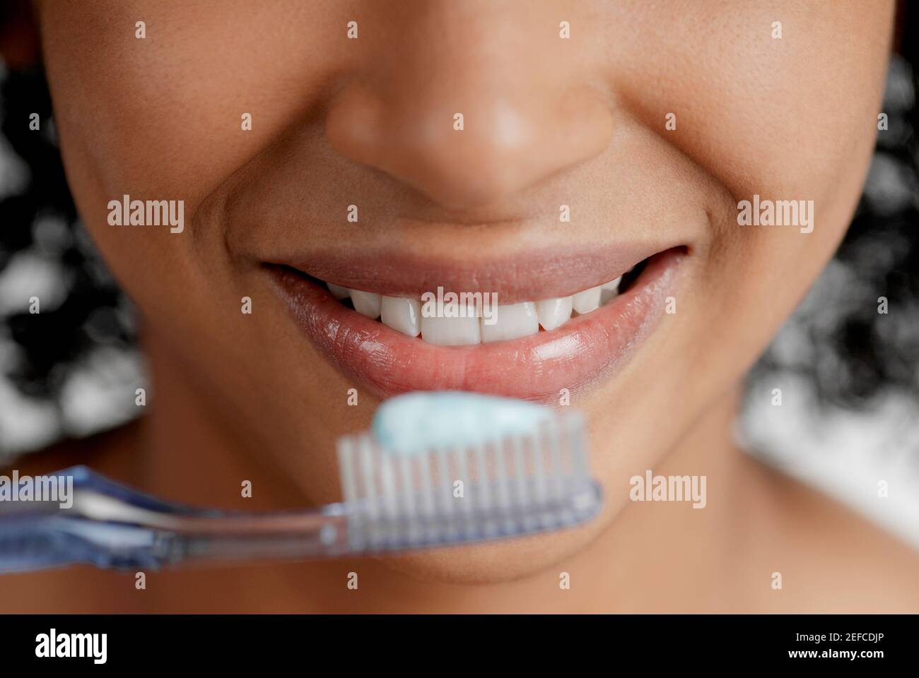Black person toothpaste hi-res stock photography and images - Alamy