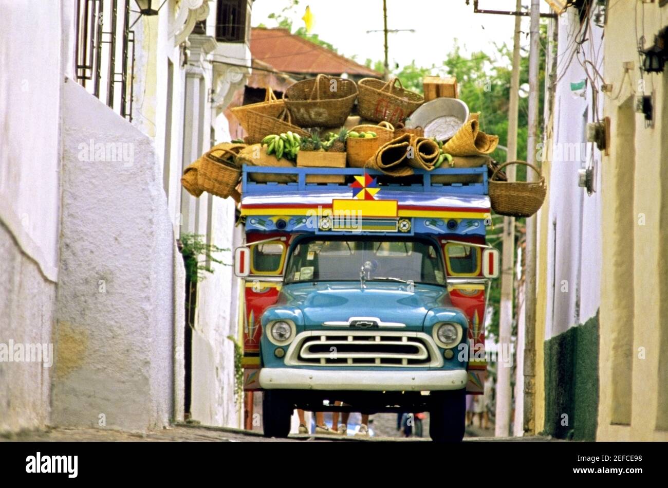 Over loaded truck on the street Stock Photo - Alamy