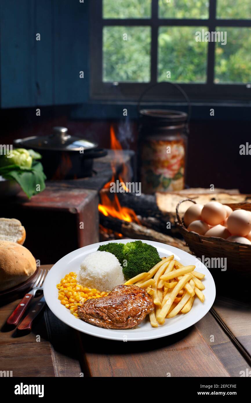 Rice with potatoes and meat Stock Photo - Alamy