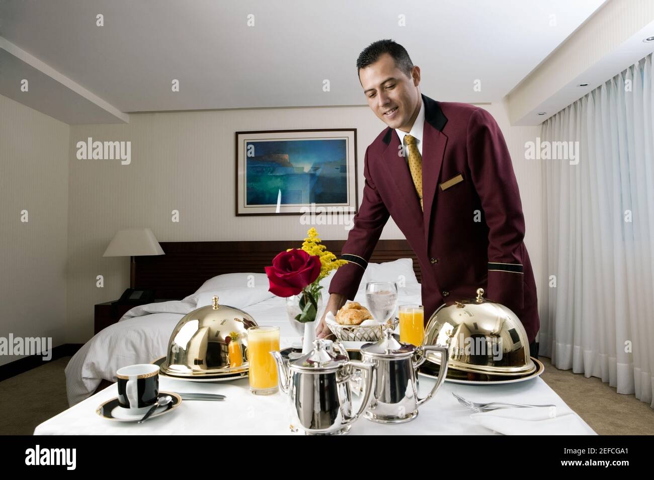 Waiter serving juice hi-res stock photography and images - Alamy