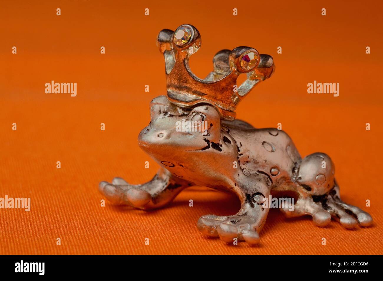 Close up of a metal frog figurine Stock Photo - Alamy
