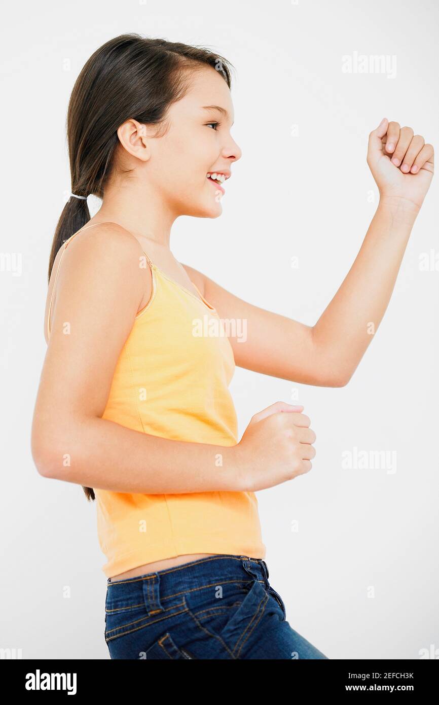 Side profile of a teenage girl dancing Stock Photo - Alamy