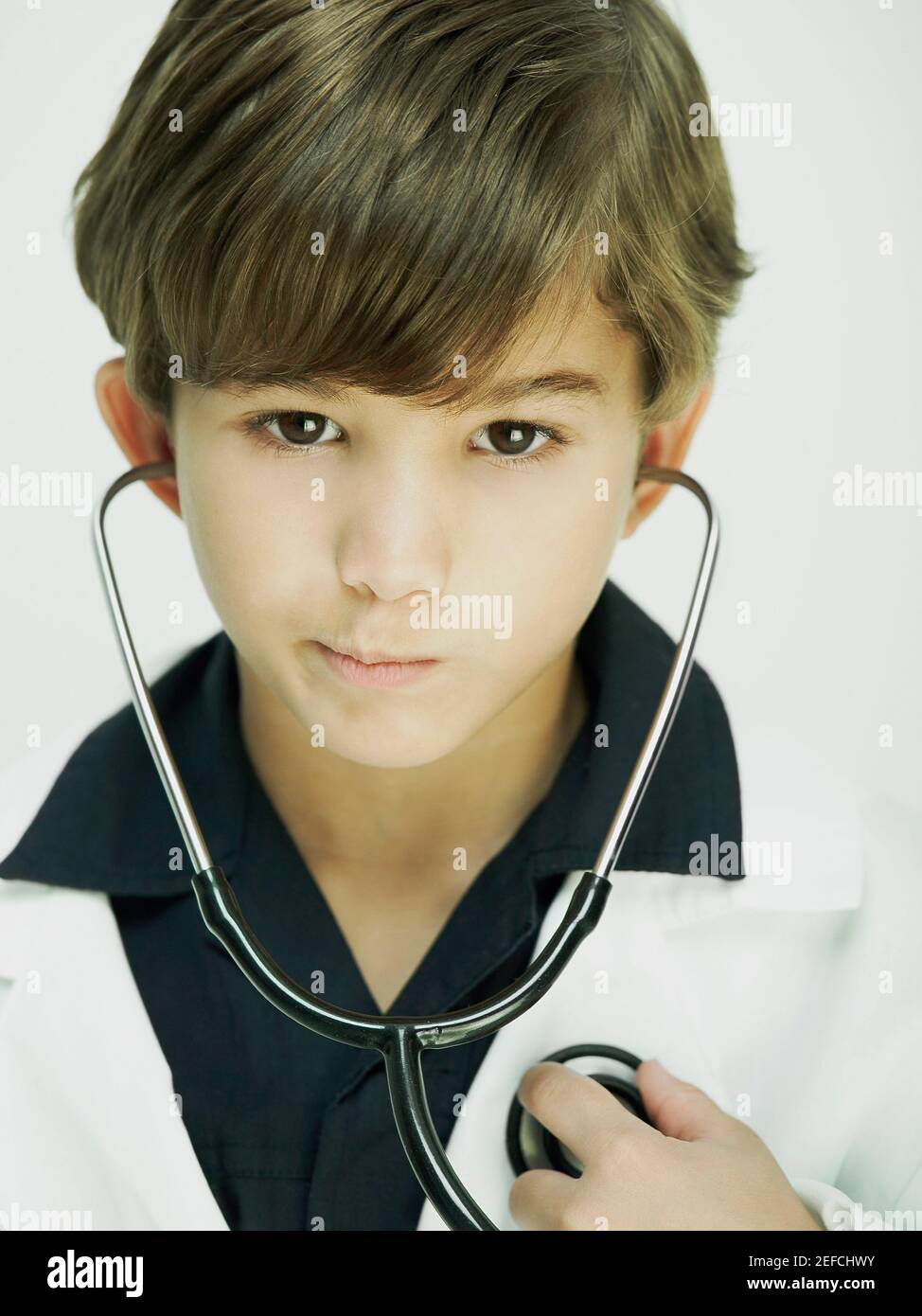 Portrait of a boy dressed as a doctor Stock Photo - Alamy