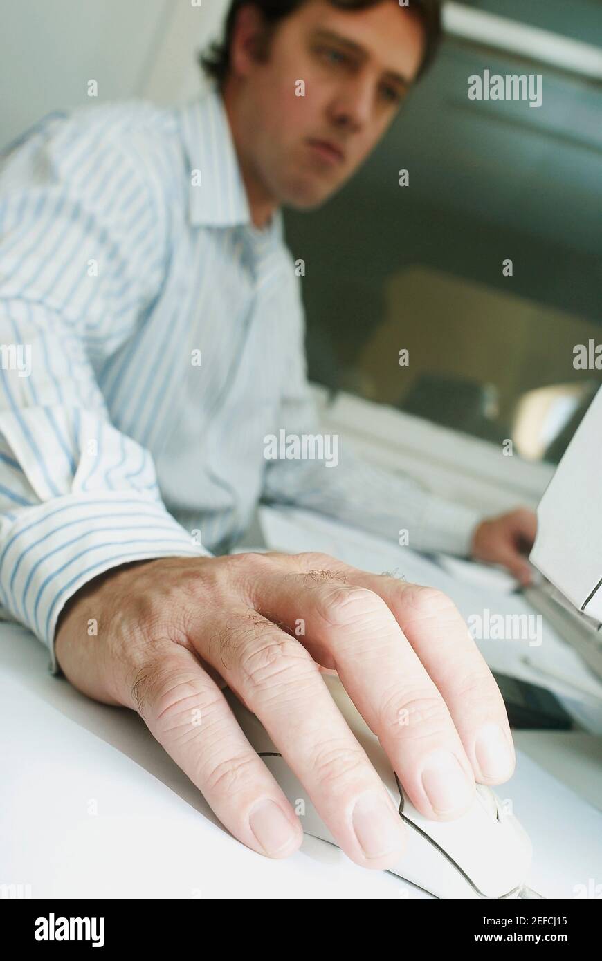 Businessman using handheld device hi-res stock photography and images ...