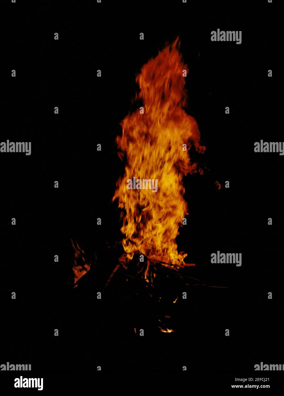 Flames of a fire at night Stock Photo - Alamy