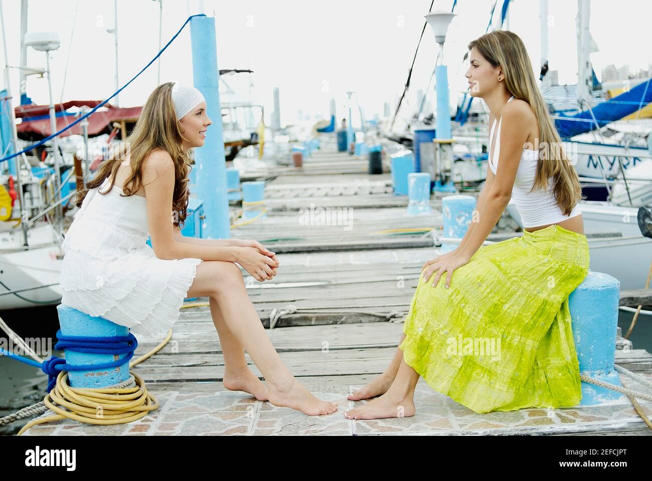 Woman barefoot dock hi-res stock photography and images - Alamy