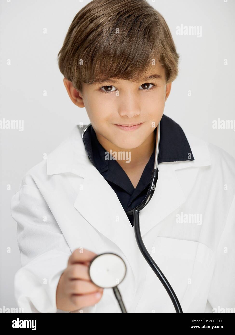 Portrait of a boy dressed as a doctor Stock Photo - Alamy