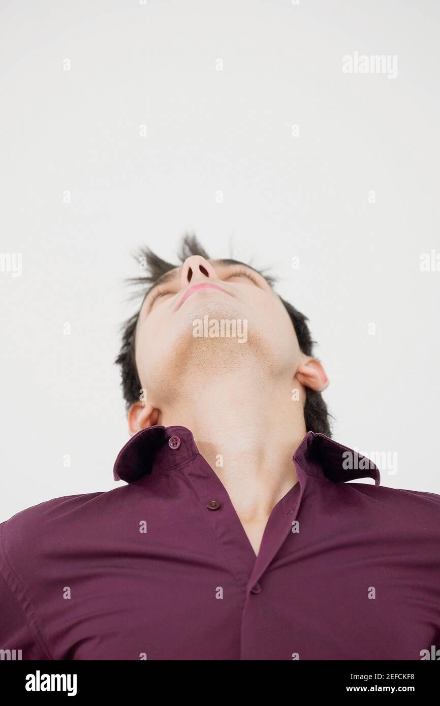 Close up of a young man with his head bent back Stock Photo - Alamy