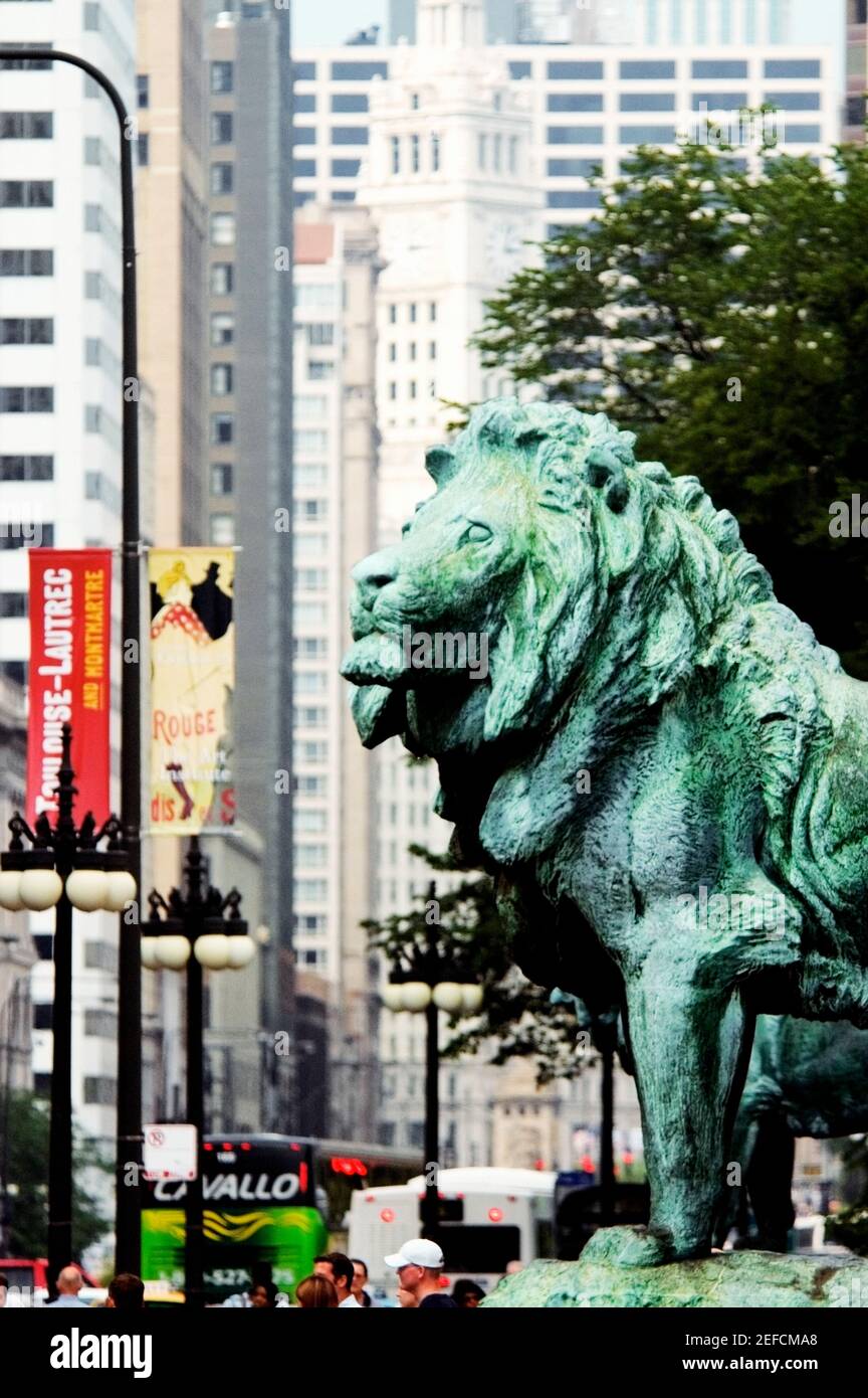 Side profile of a bronze lion statue, Art Institute of Chicago, Chicago ...