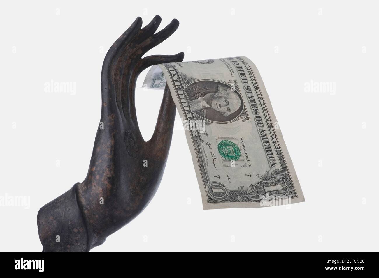 Close up of the sculpture of a human hand holding one dollar bill Stock ...