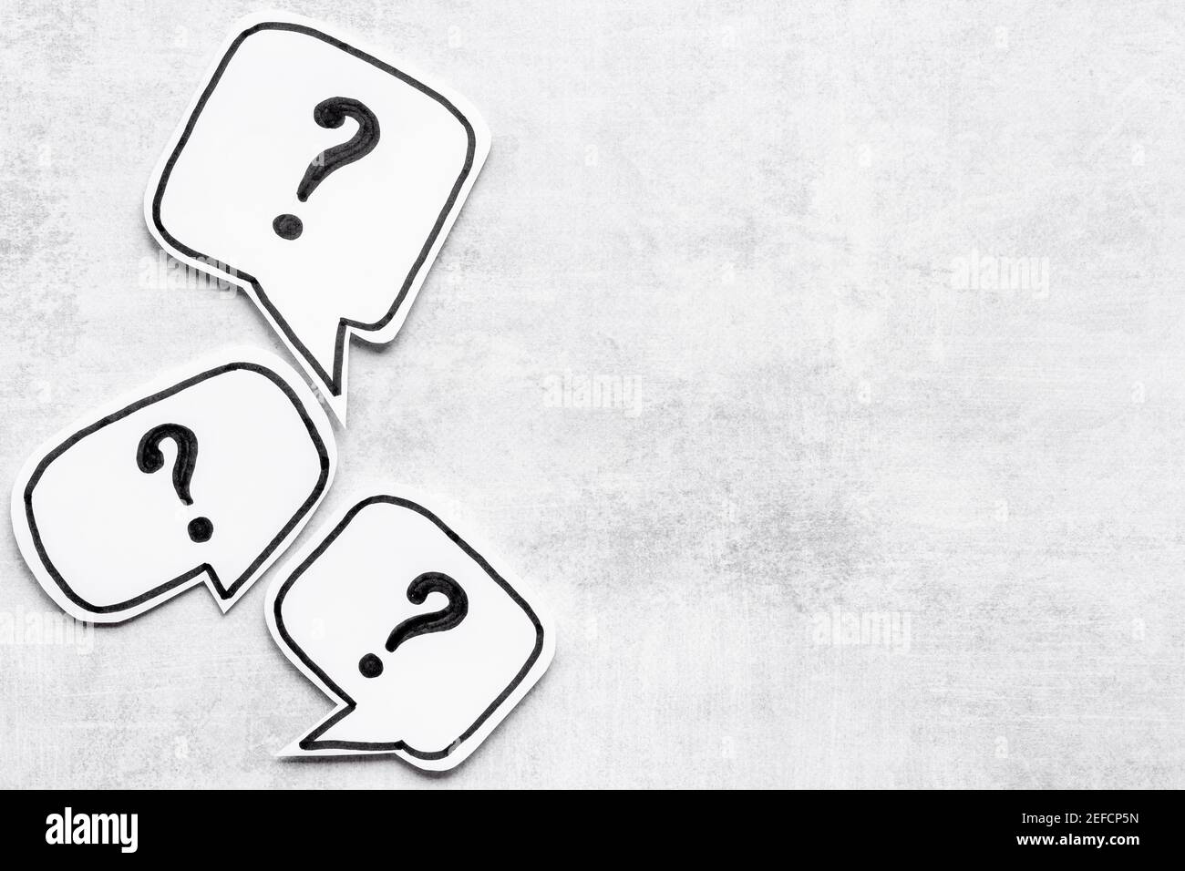 Question mark on paper bubbles, top view. Question concept Stock Photo ...