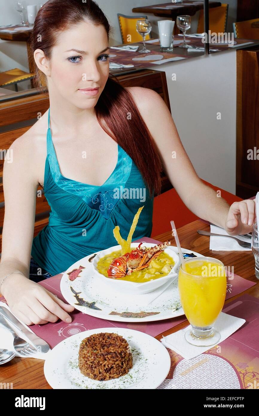 Woman meal table alone hi-res stock photography and images - Alamy