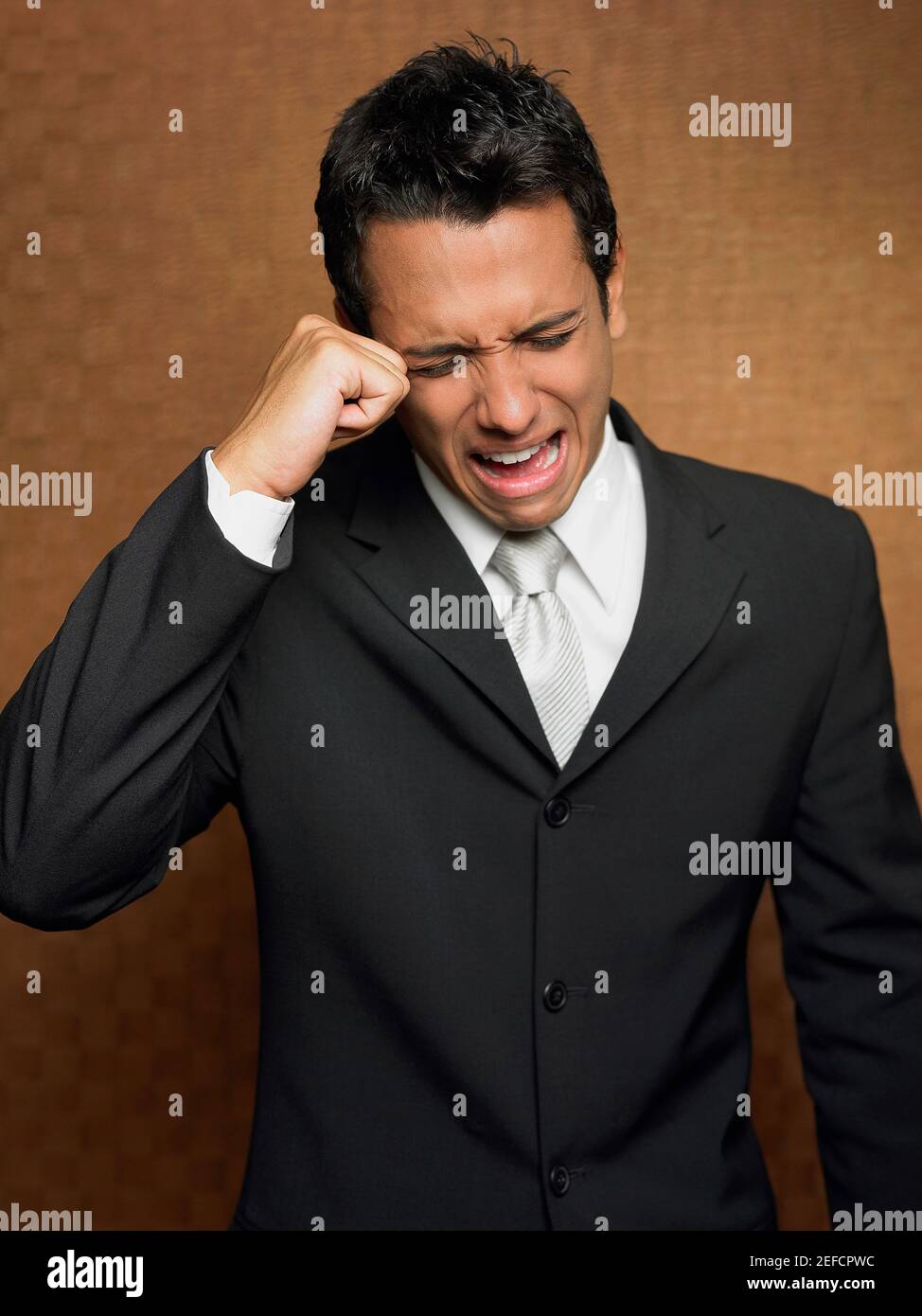 Close up of a businessman crying Stock Photo - Alamy