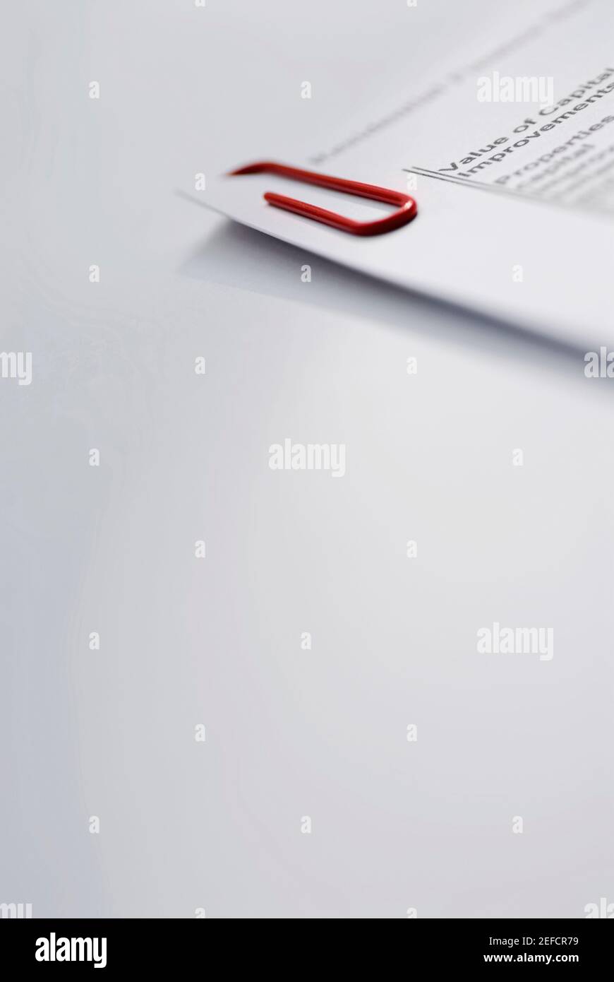 Close up of a paper clip on documents Stock Photo - Alamy
