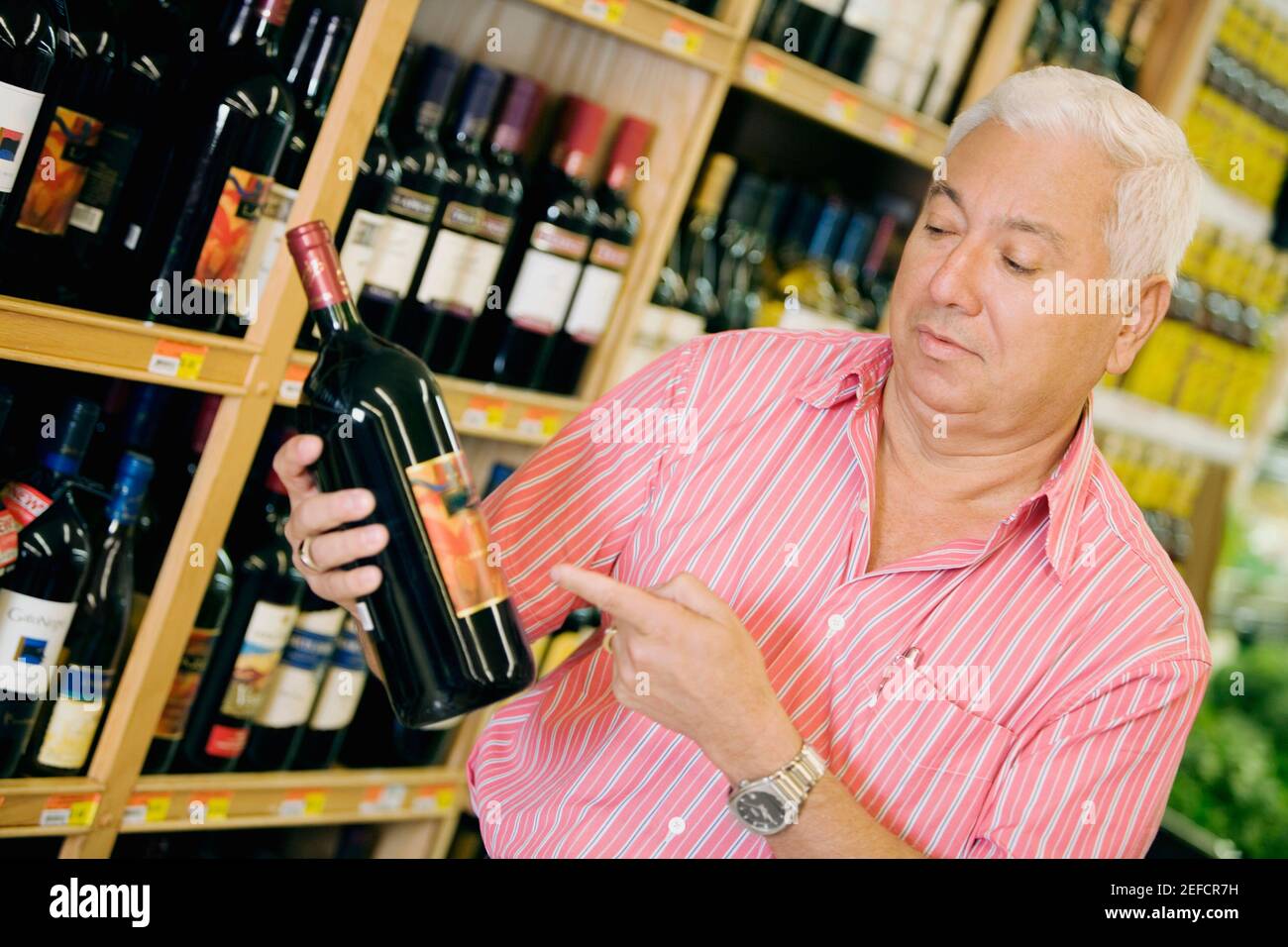 Man reading food label hi-res stock photography and images - Alamy