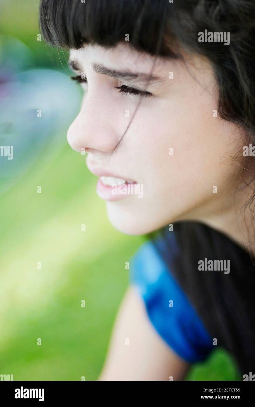 Close up of a girl thinking Stock Photo - Alamy