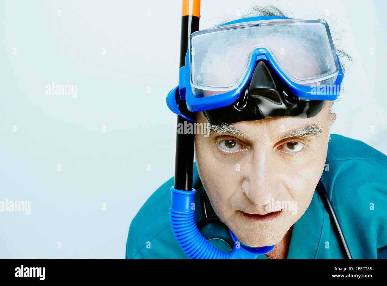 Portrait of a senior man wearing scuba mask Stock Photo - Alamy