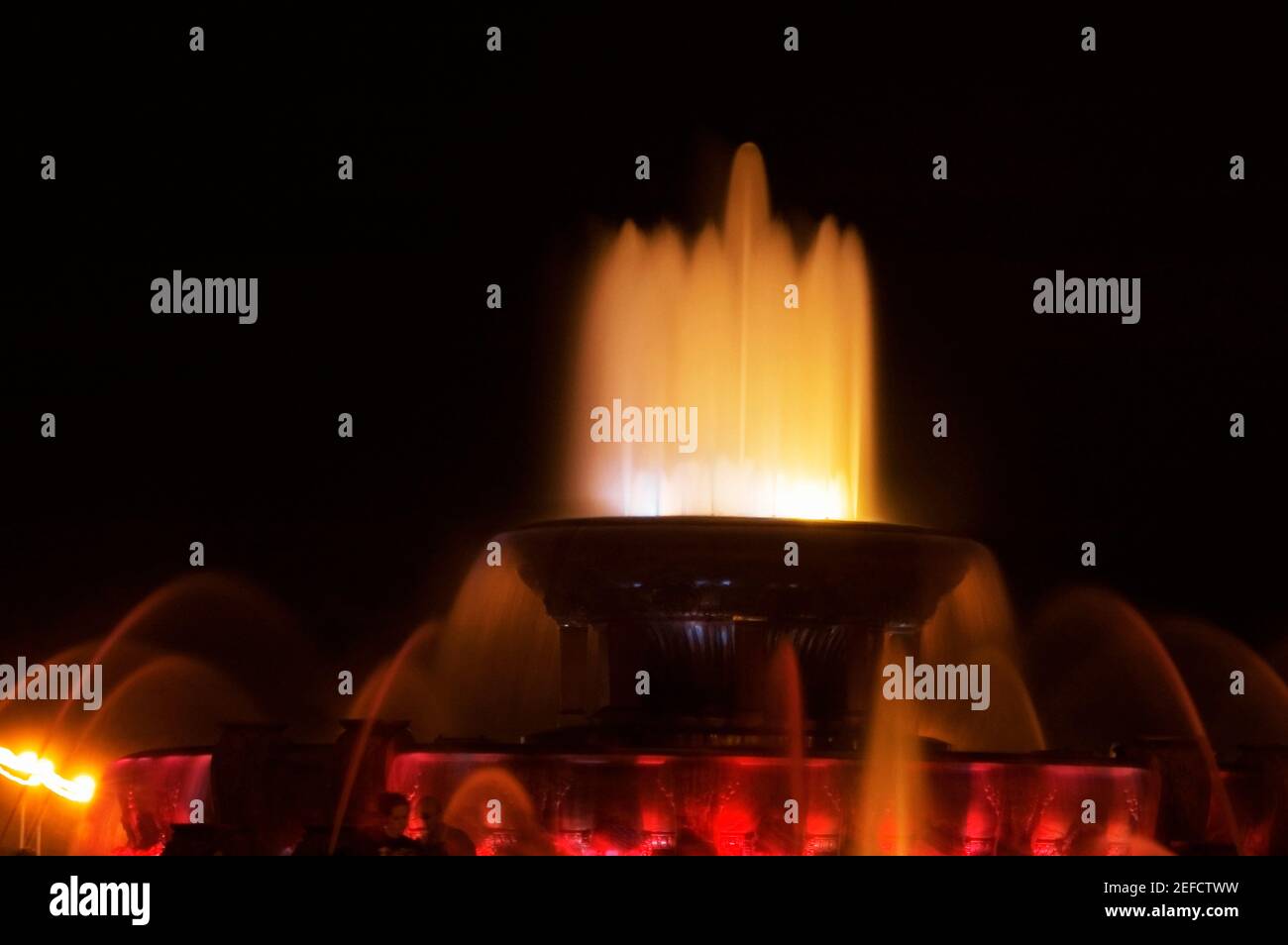 Water fountain lit up at night, Clarence Buckingham Fountain, Chicago ...