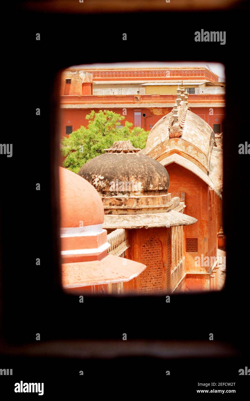 High section view of domes seen through a window, City Palace, Jaipur ...