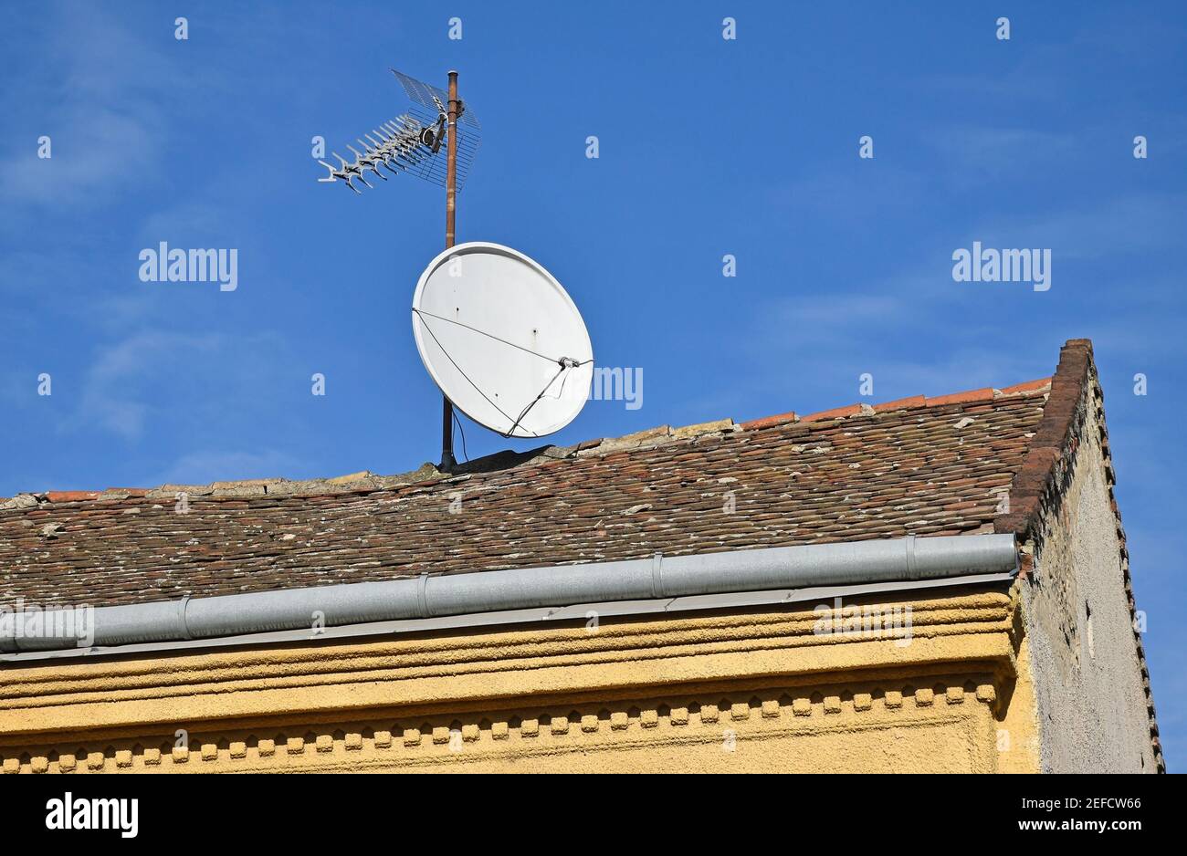House roof with television antennas Stock Photo - Alamy