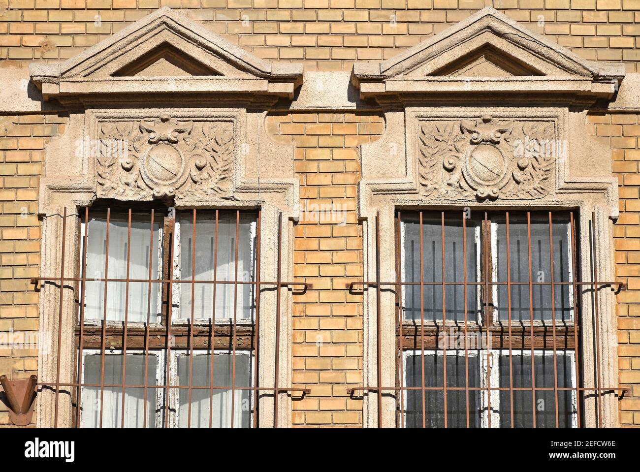 Windows of an old brick house Stock Photo - Alamy