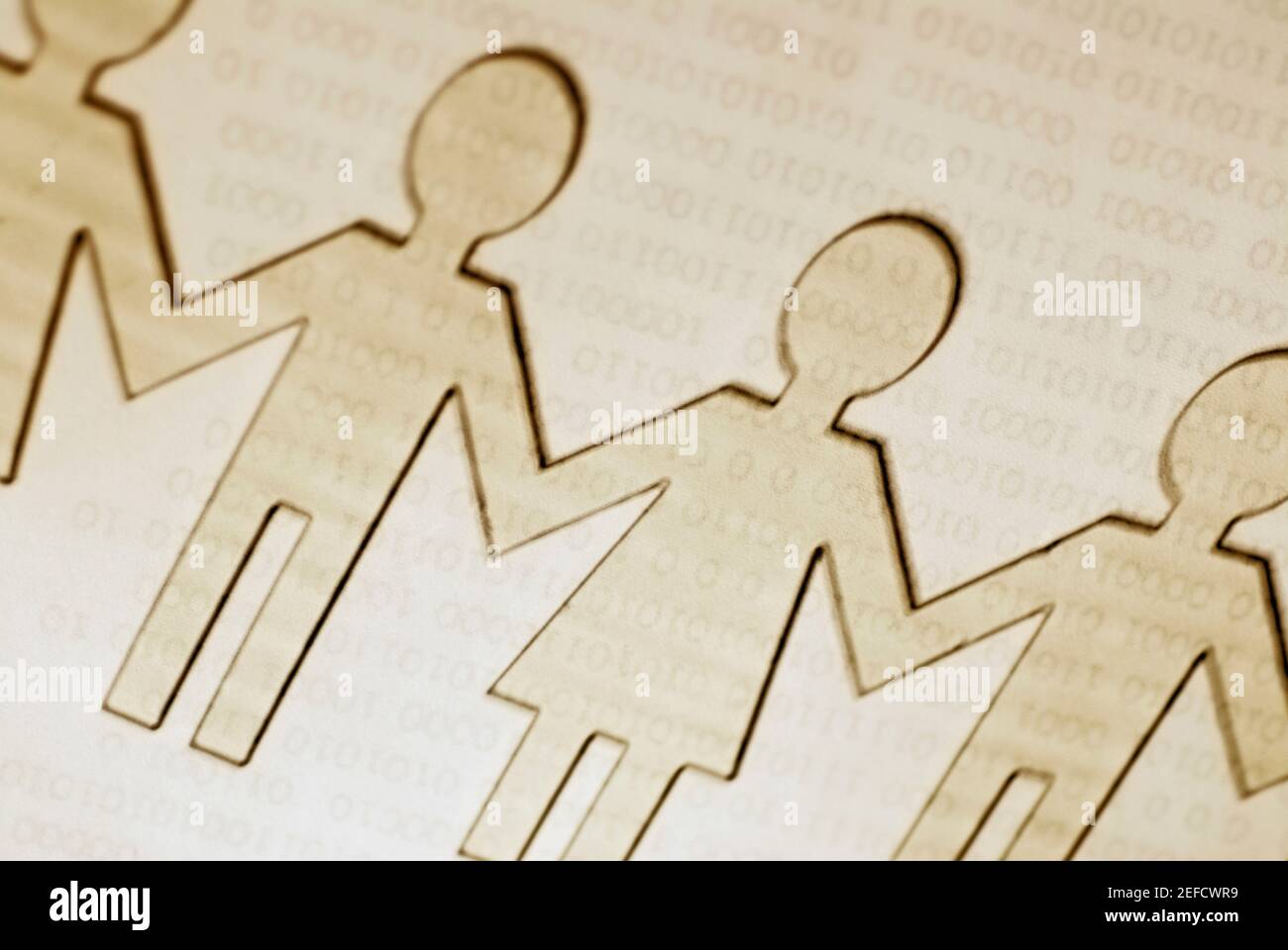 Paper doll chain hi-res stock photography and images - Alamy