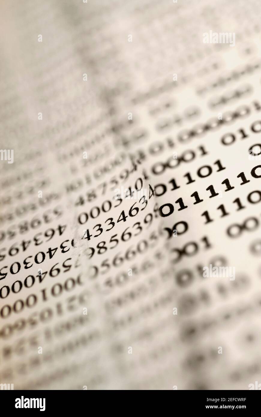 Close up of financial figures with binary code Stock Photo - Alamy