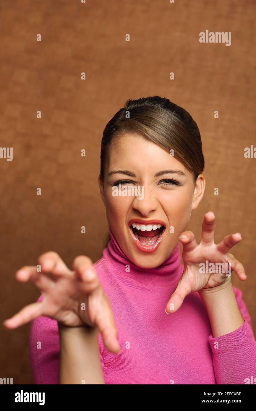 Portrait of a teenage girl shouting Stock Photo - Alamy