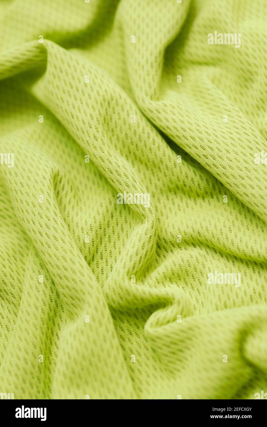 Green wrinkled fabric hi-res stock photography and images - Alamy