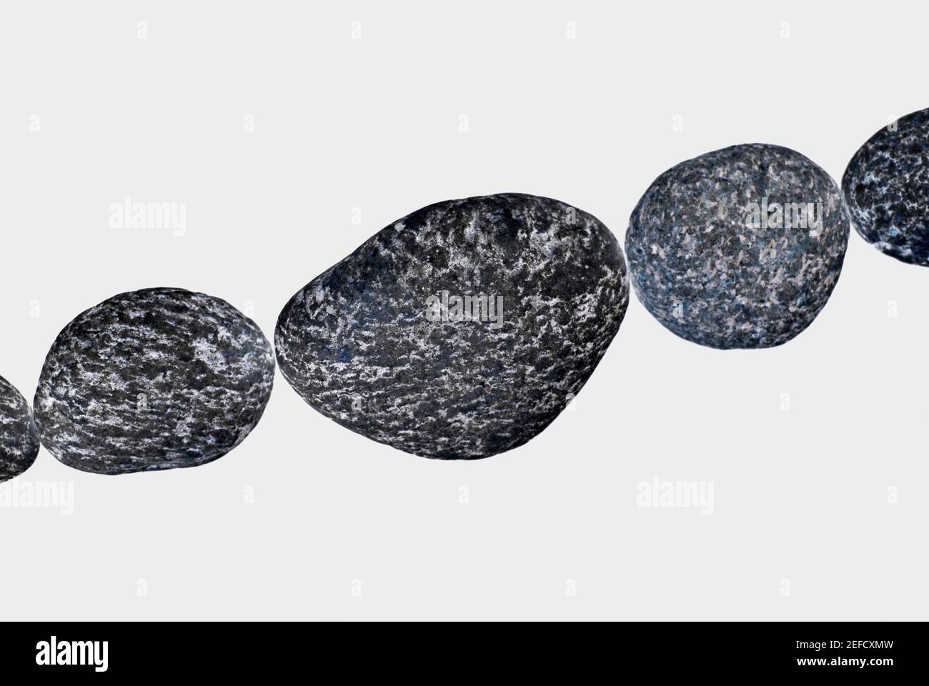 Row of pebbles hi-res stock photography and images - Alamy