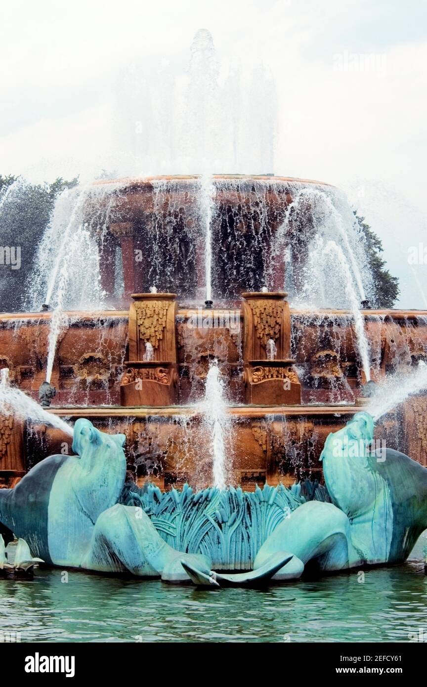 Water spraying from the mouth of a bronze statue, Clarence Buckingham ...