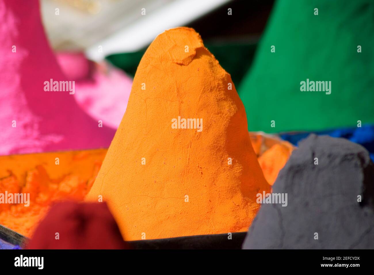 Close-up of mounds of colored powder used for Hindu rituals, Pushkar ...