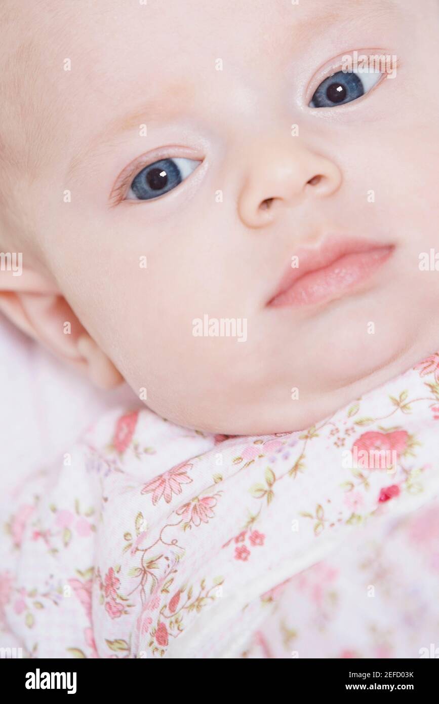 Baby girl with head back hi-res stock photography and images - Alamy