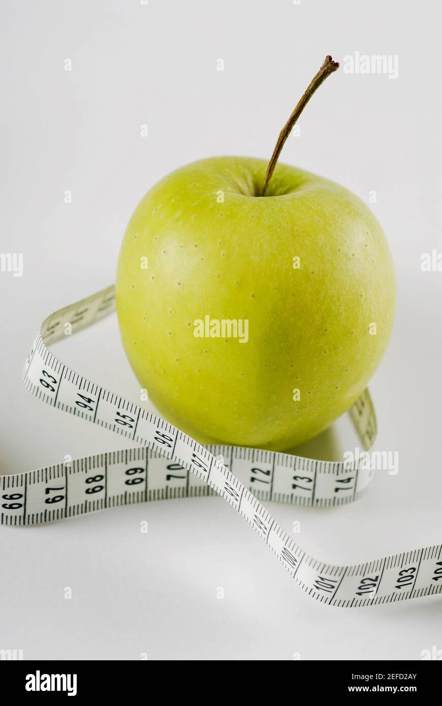 Apple is inside a tape hi-res stock photography and images - Alamy