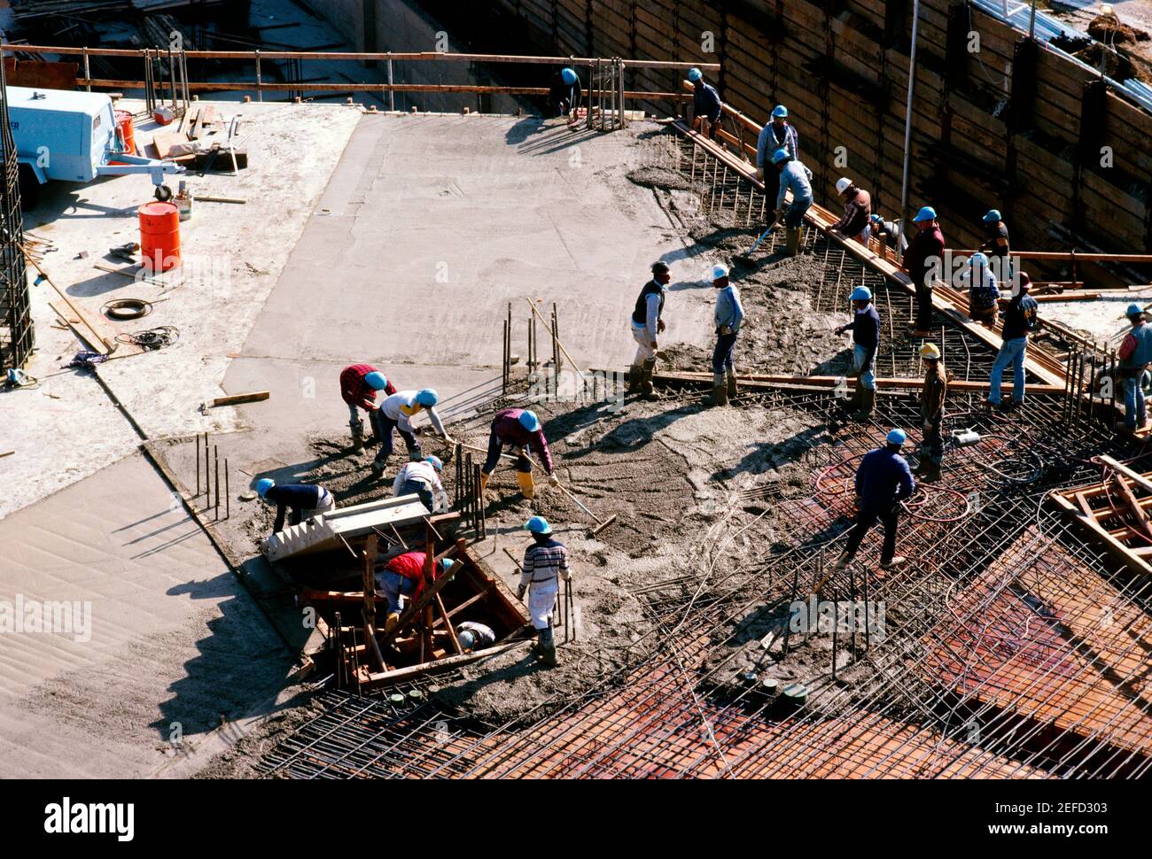 Construction workers on the construction site Stock Photo - Alamy