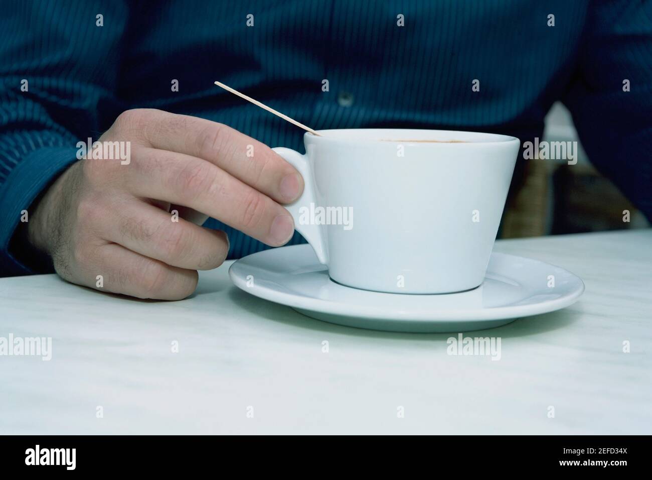 Holding tea cup finger hi-res stock photography and images - Alamy