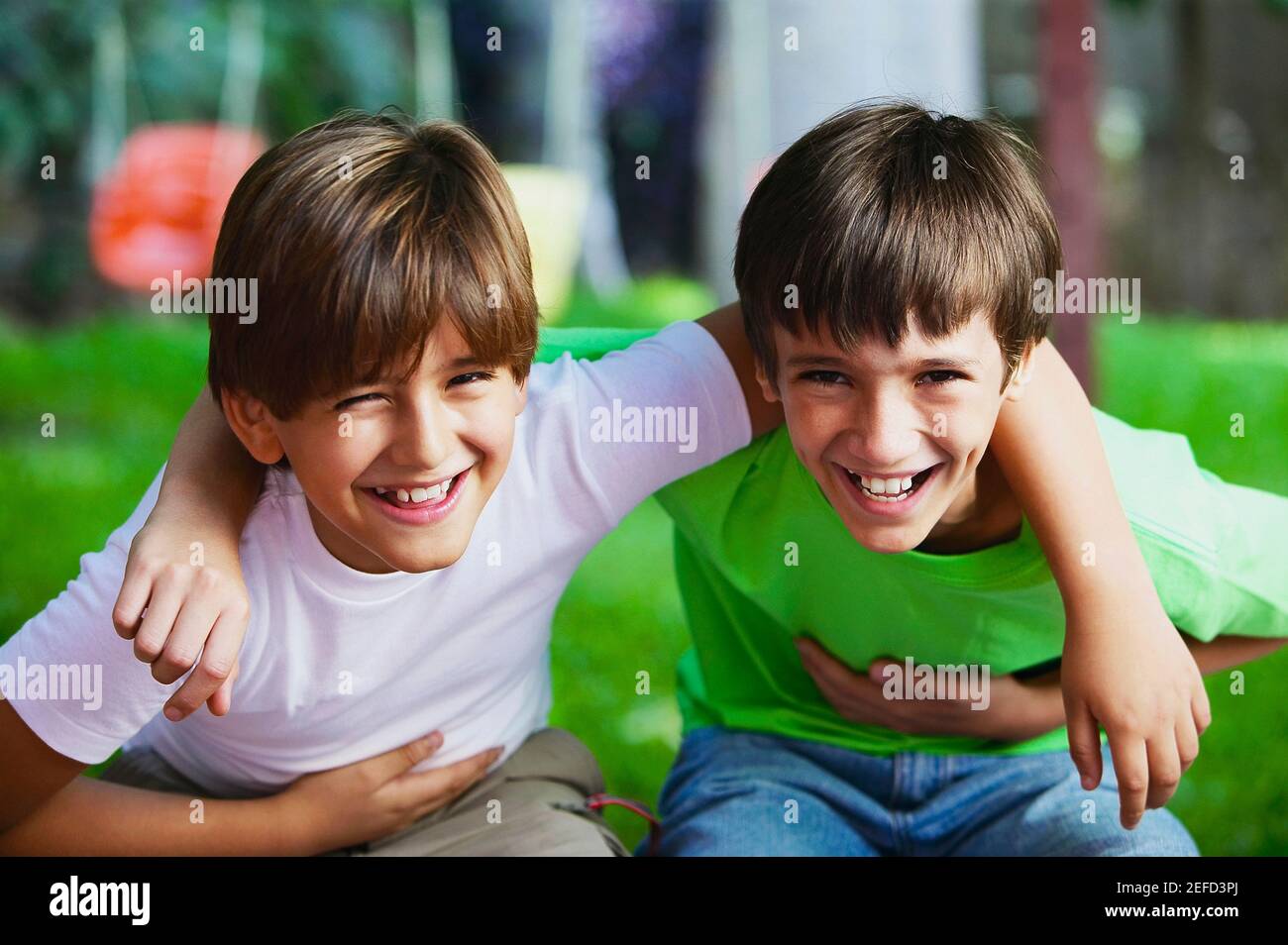 Portrait of two boys smiling Stock Photo - Alamy