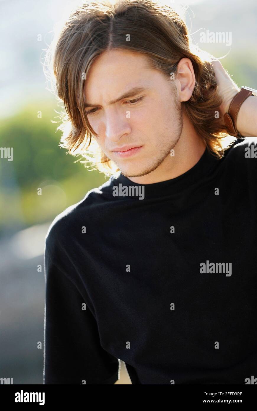 Close up of a teenage boy thinking Stock Photo - Alamy