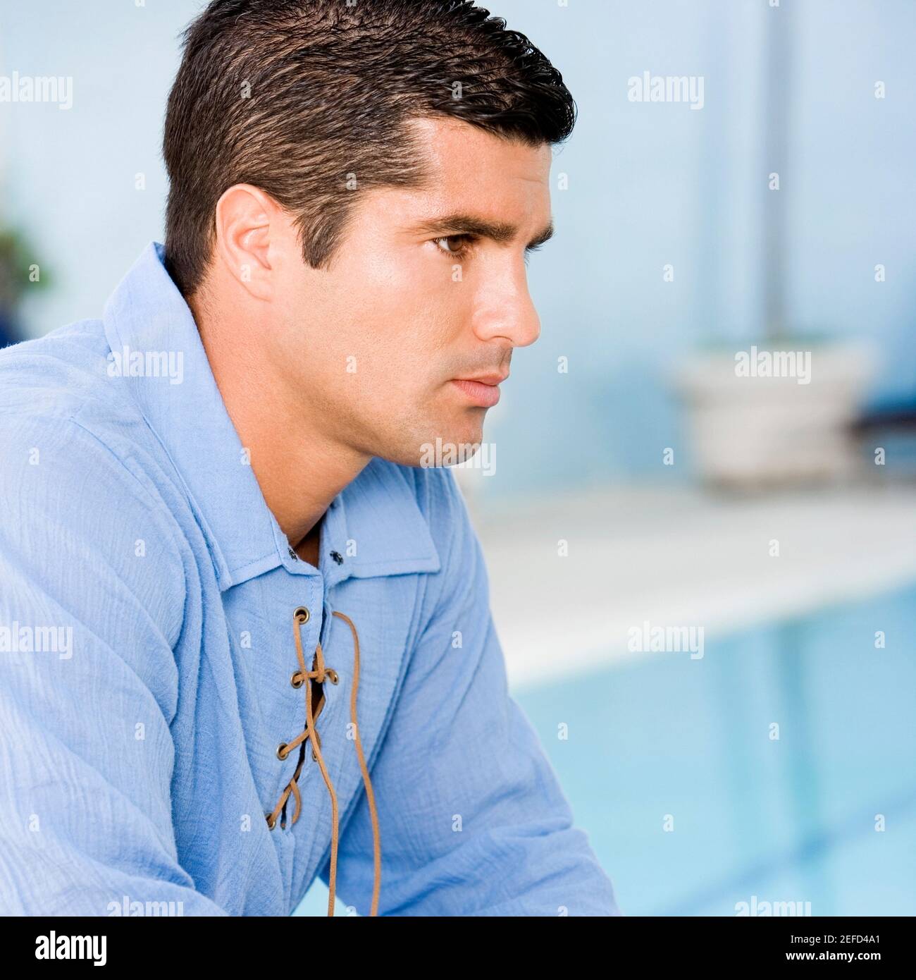 Side profile of a mid adult man looking serious Stock Photo - Alamy