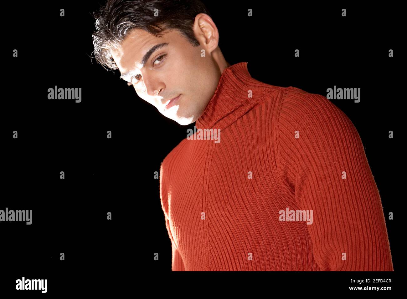 Portrait of a young man looking serious Stock Photo - Alamy