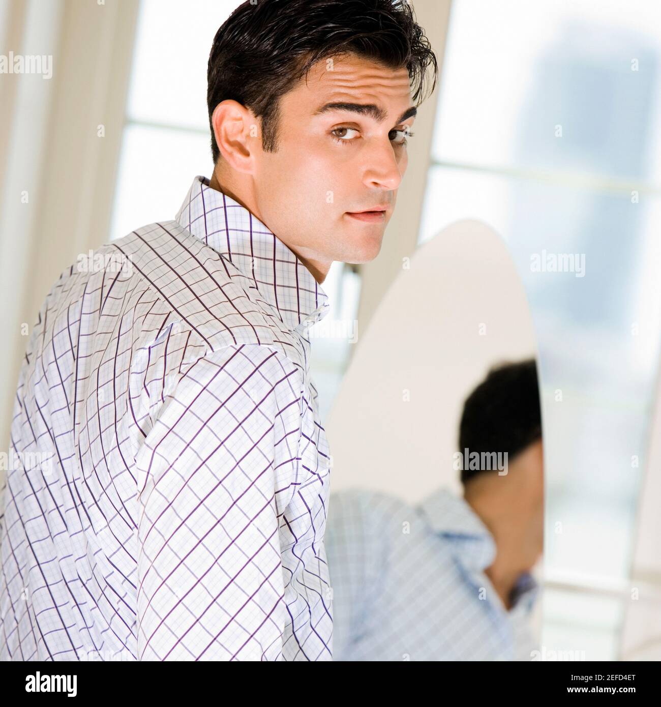 Male self portrait in a mirror hi-res stock photography and images - Alamy