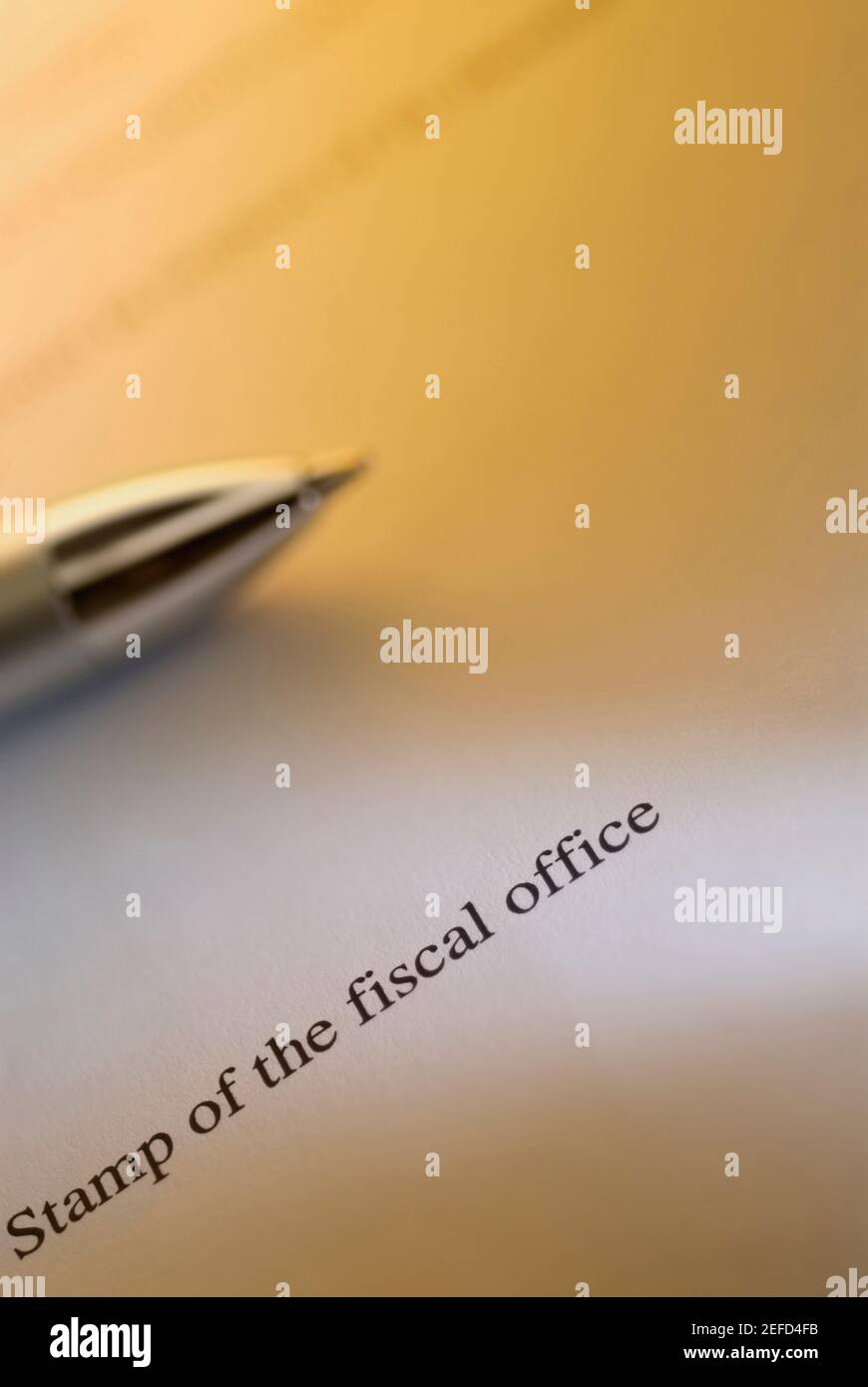 Pen on a document Stock Photo - Alamy