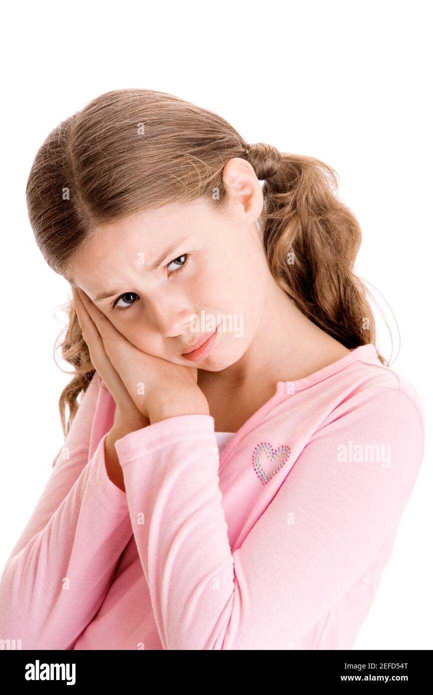 Portrait of a girl looking sad Stock Photo - Alamy