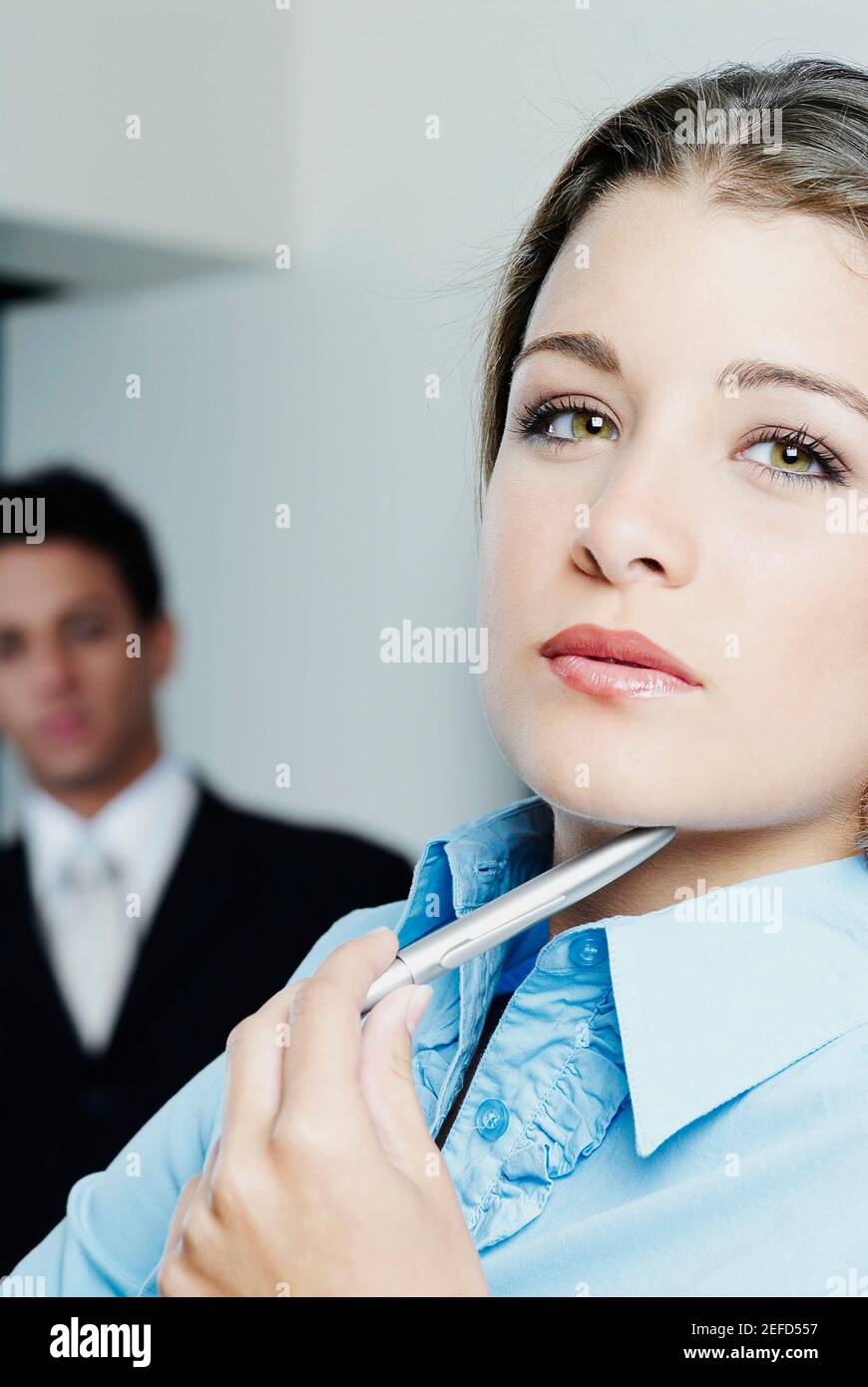 Close up of a teenage girl thinking Stock Photo - Alamy