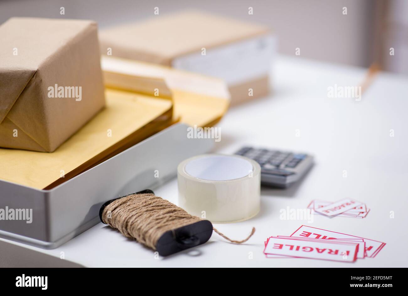 parcel boxes and packing stuff at post office Stock Photo - Alamy